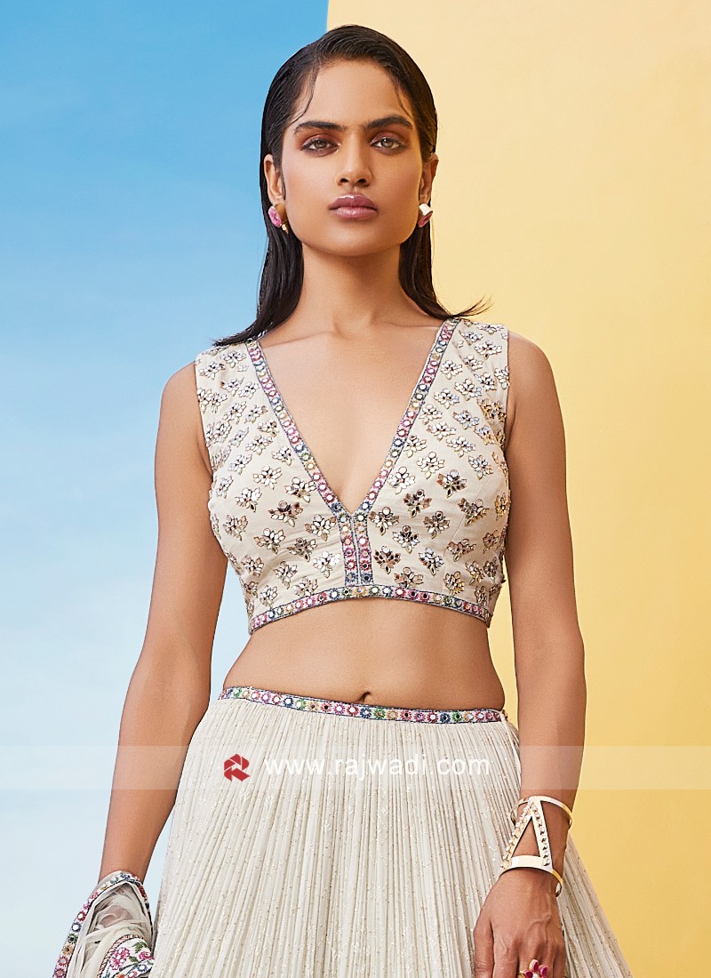 Shimmering Cream Embroidered Chiffon Lehenga Choli Shimmering Cream Embroidered Chiffon Lehenga Choli