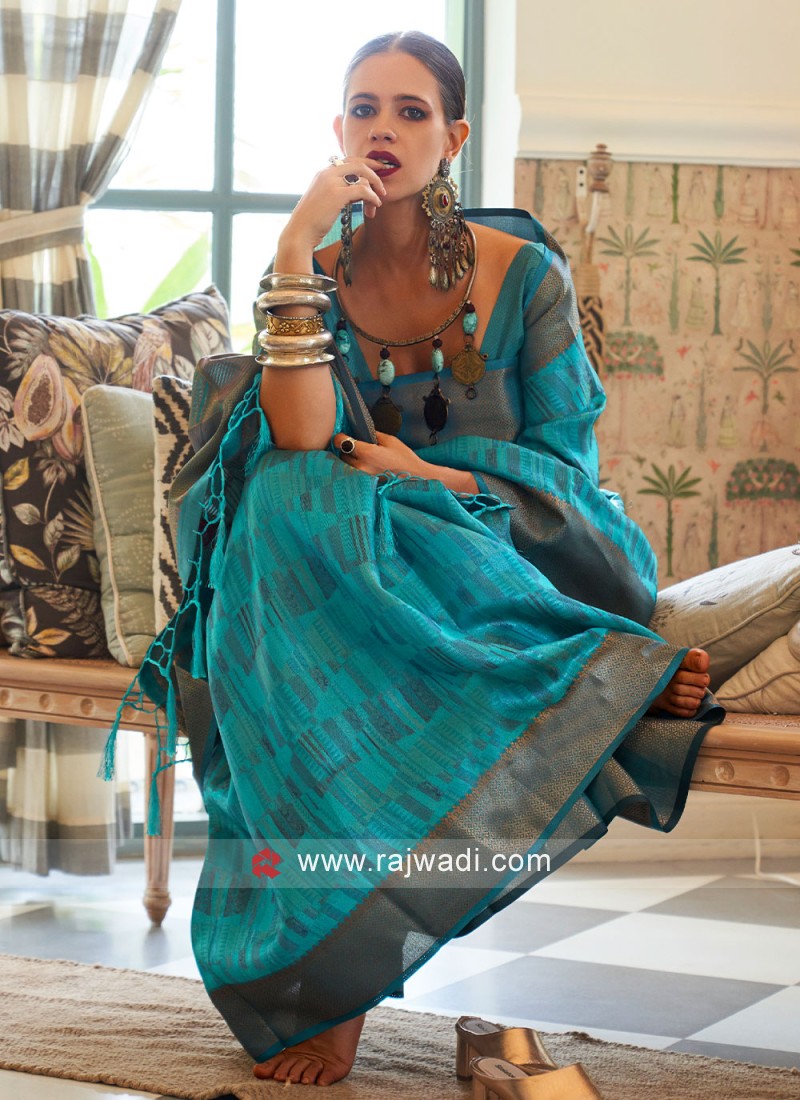 Ravishing Turquoise Handloom Silk and Organza Designer Saree Ravishing Turquoise Handloom Silk and Organza Designer Saree